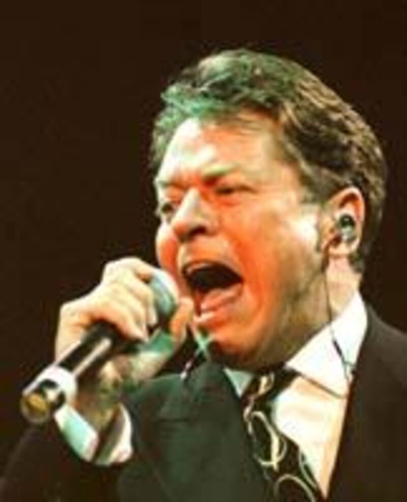 Rock singer Robert Palmer dies of heart attack at 54 – Deseret News